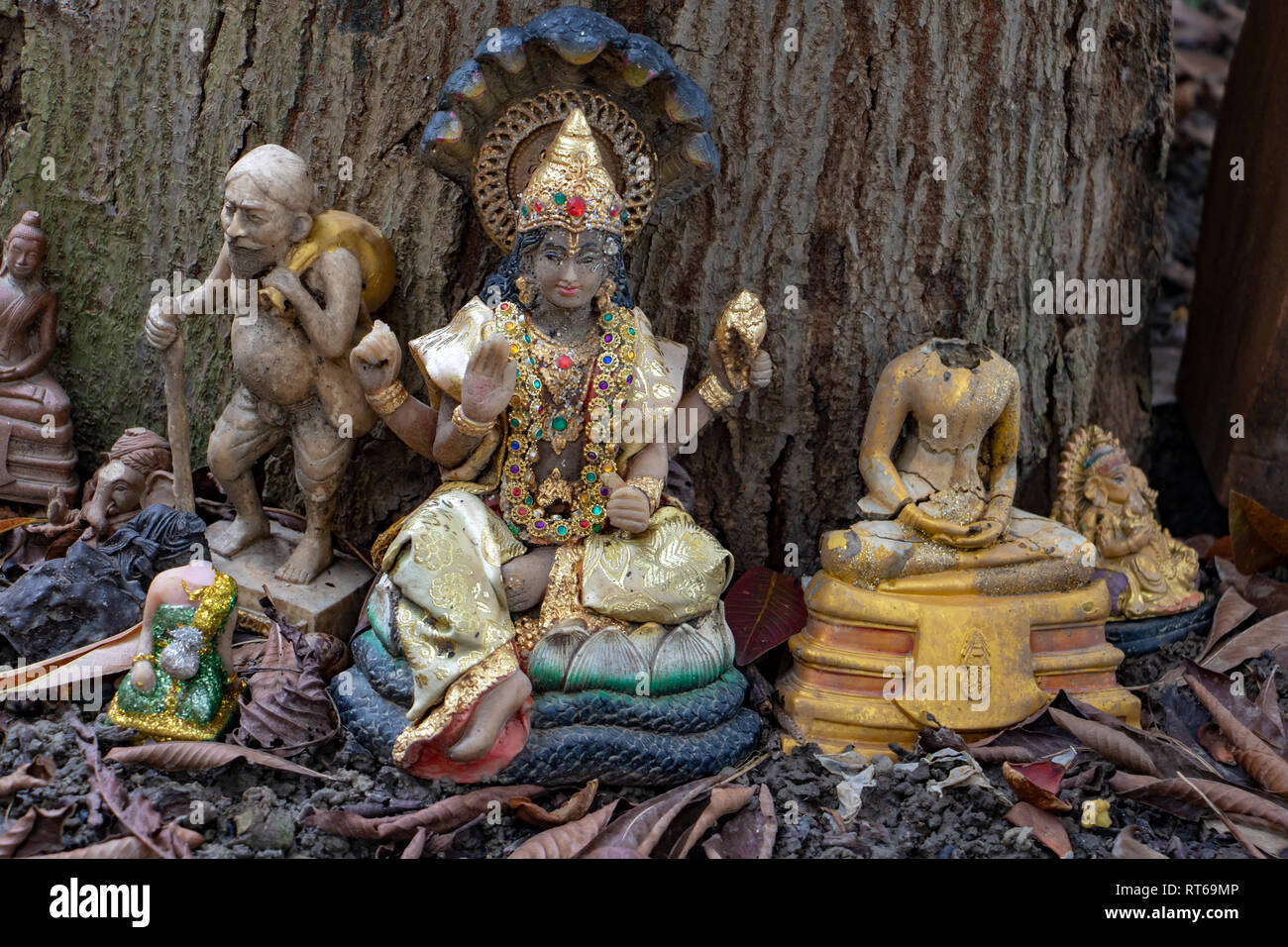 Buddhist shrine under tree hi-res stock photography and images - Alamy
