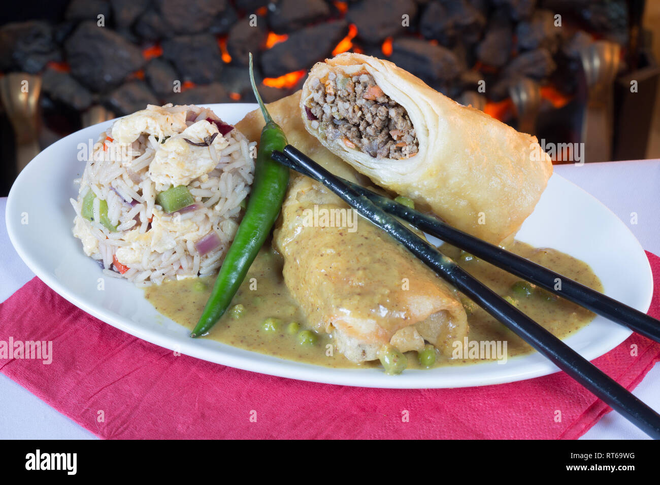 Chinese style Beef spring roll with Egg fried rice and curry sauce ...