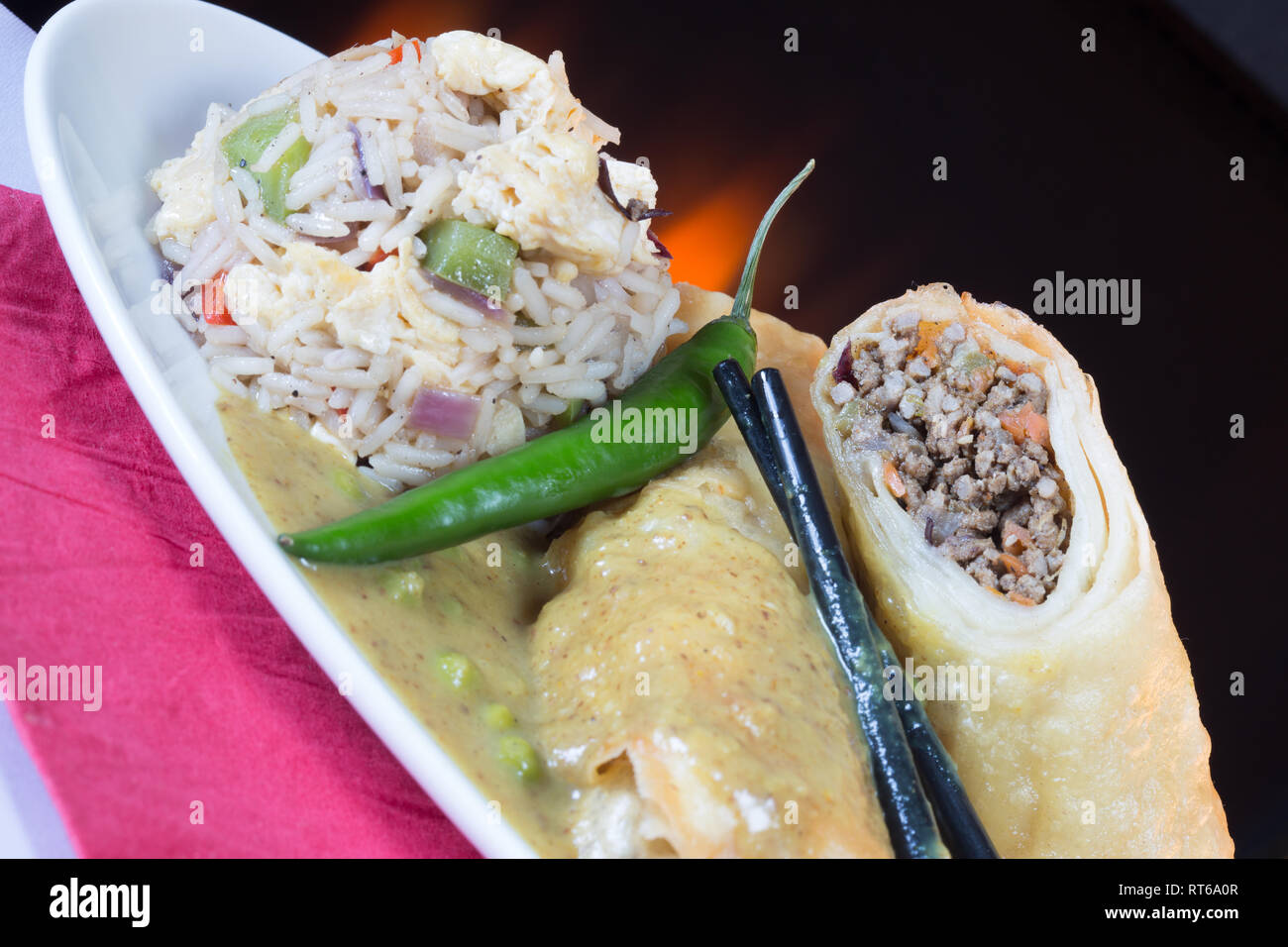 Chinese style Beef spring roll with Egg fried rice and curry sauce ...