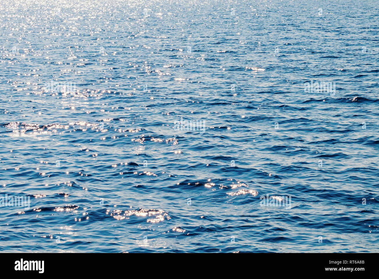 Ocean water surface background Stock Photo - Alamy