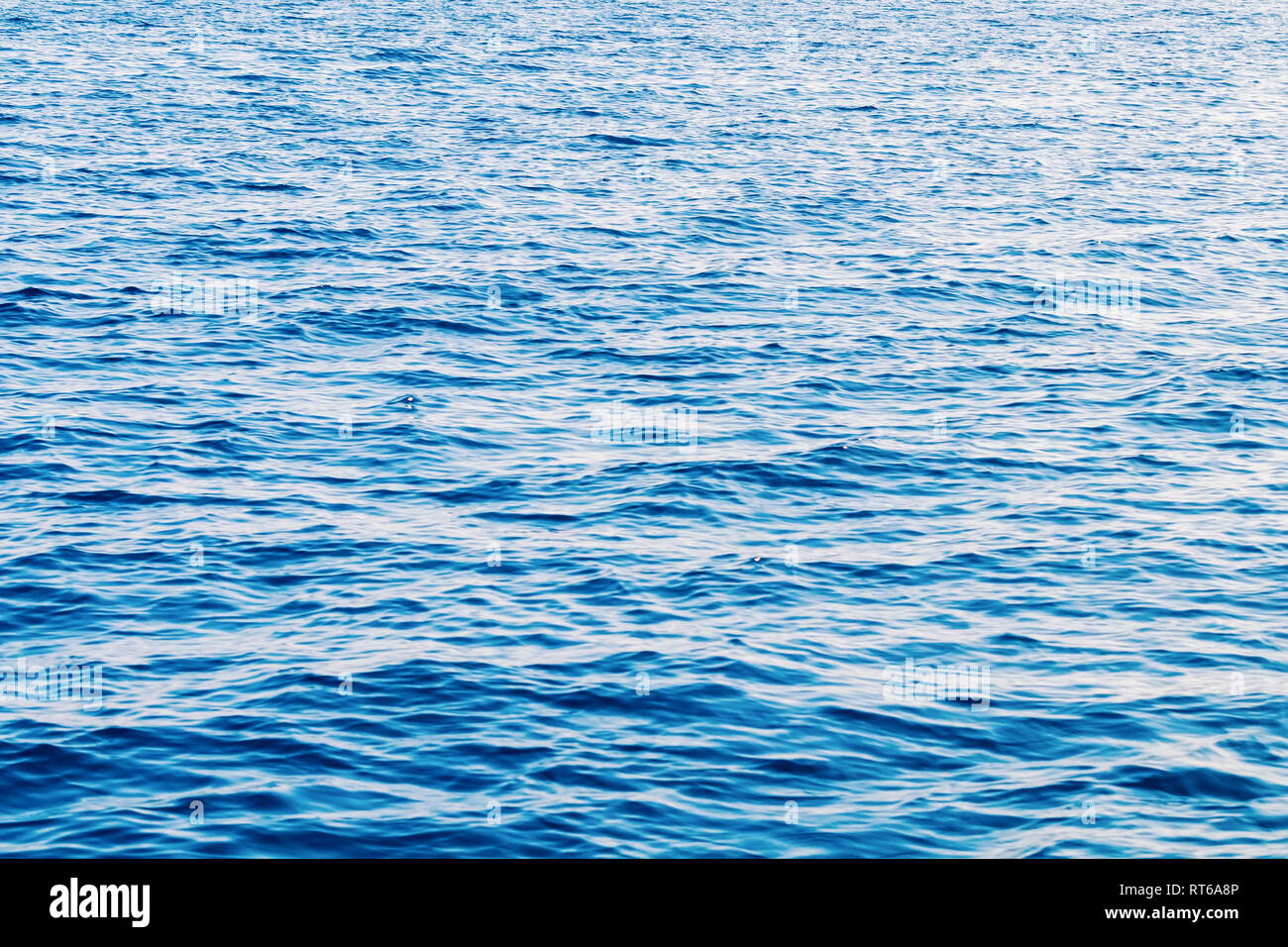 Ocean water surface background Stock Photo - Alamy