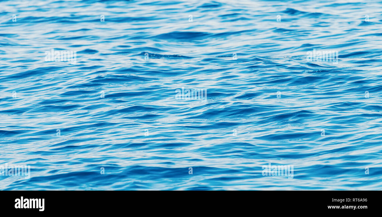 Ocean water surface background Stock Photo - Alamy