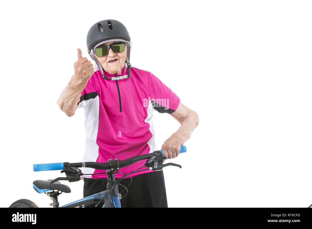Old biker woman in a helmet Stock Photo - Alamy