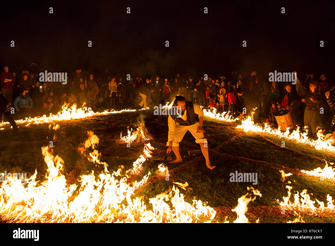 Crowd watching fire show at Beltane Fire Festival, Sussex, UK Stock ...