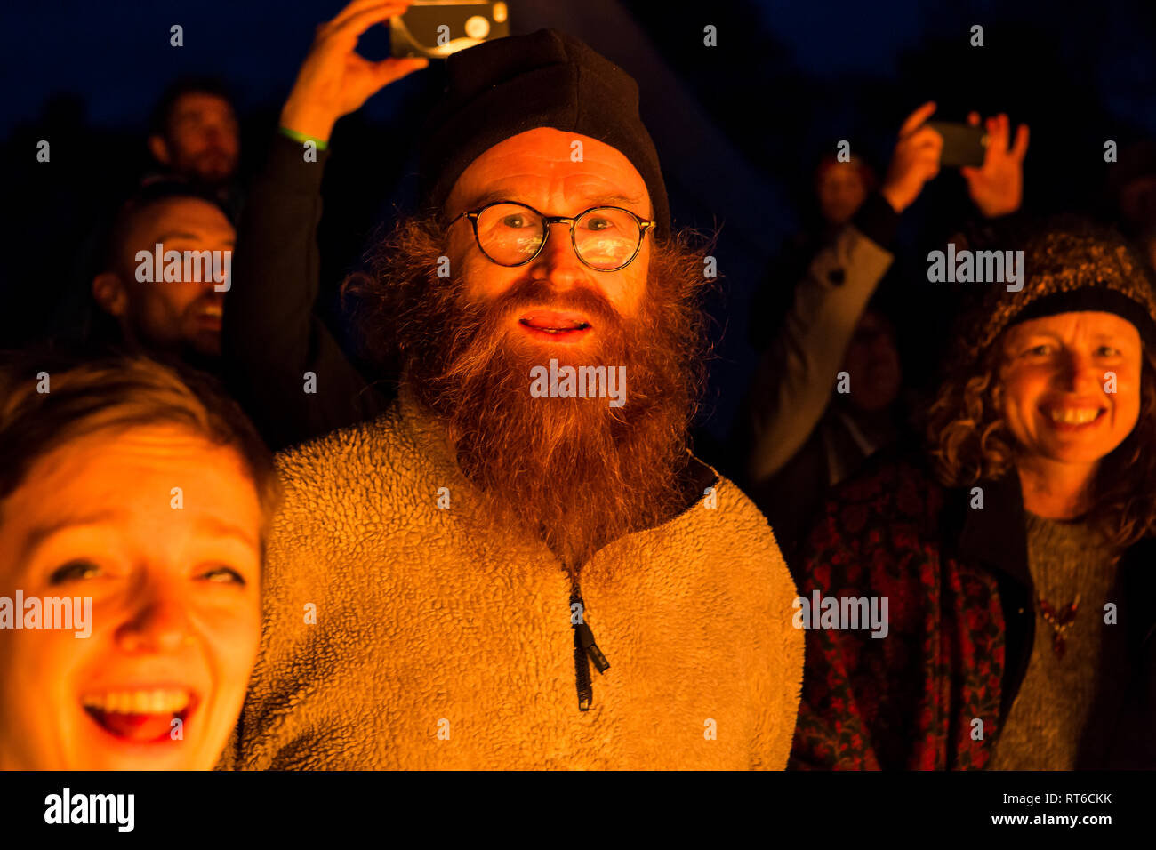 In the crowd watching fire show at Beltane Fire Festival, Sussex, UK ...