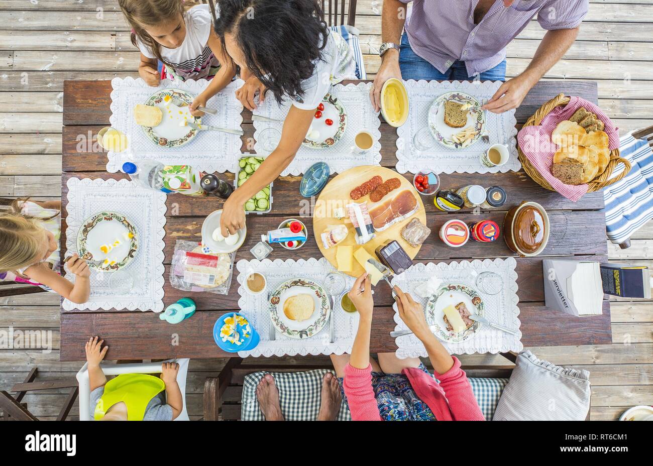 Flat-lay of friends eating together. Top view of people having party ...