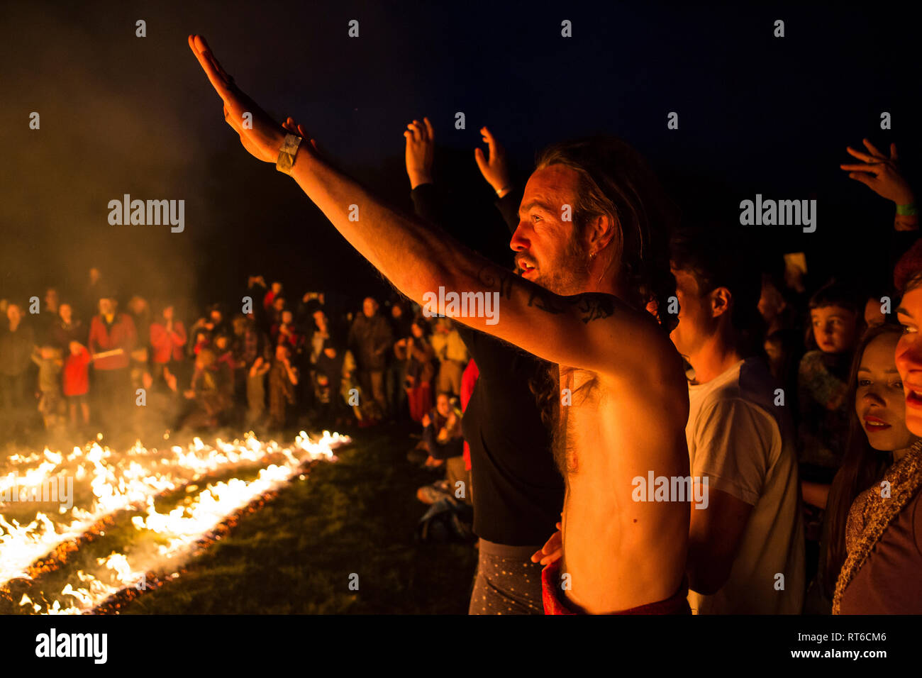 Crowd watching fire show at Beltane Fire Festival, Sussex, UK Stock ...