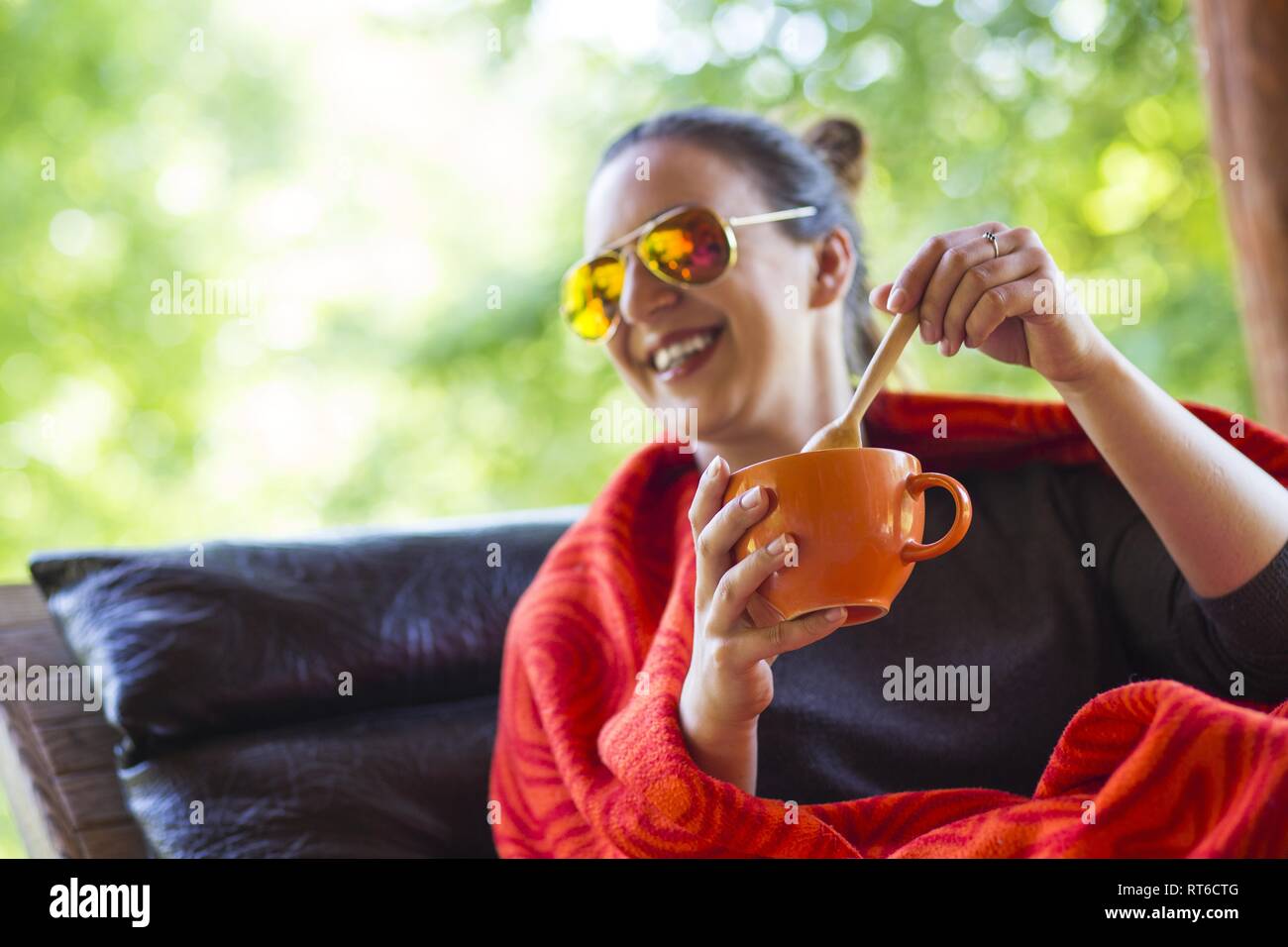Woman relaxing on holiday hi-res stock photography and images - Alamy