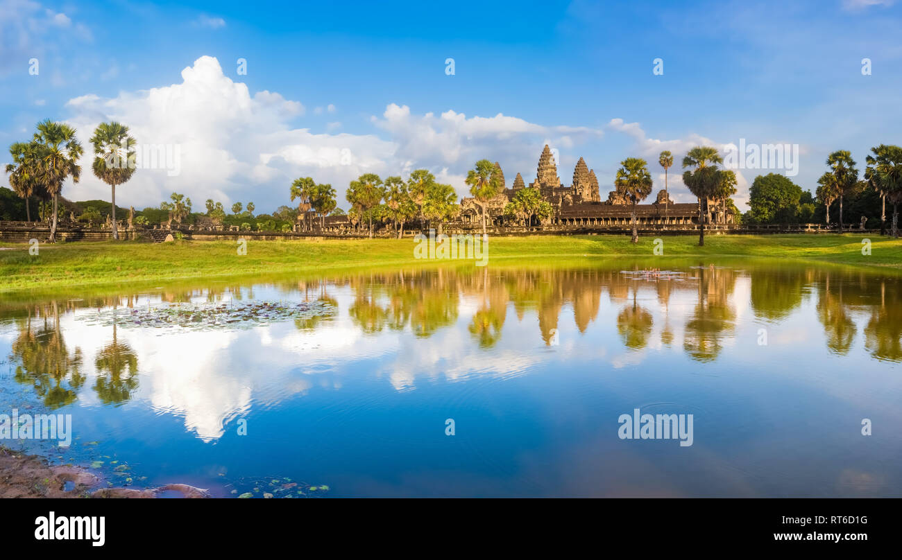 Angkor Wat temple reflecting in water of Lotus pond at sunset. Siem ...