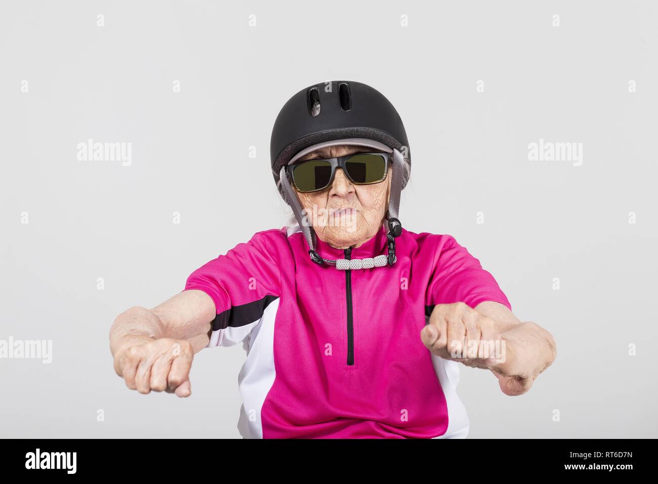 Old biker woman in a helmet Stock Photo - Alamy