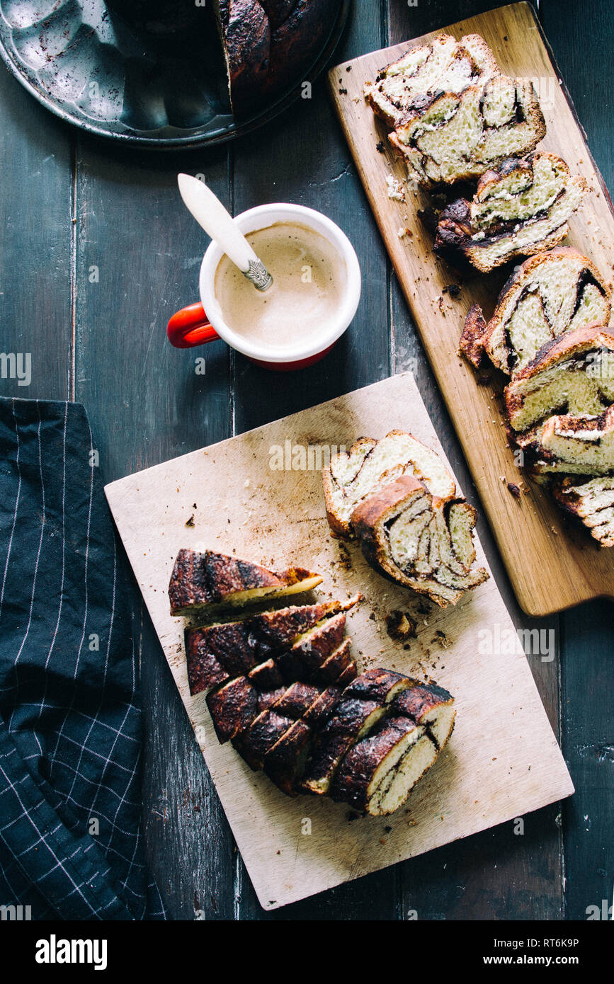 Babka jewish baked is ready to be eaten, over a wooden background ...