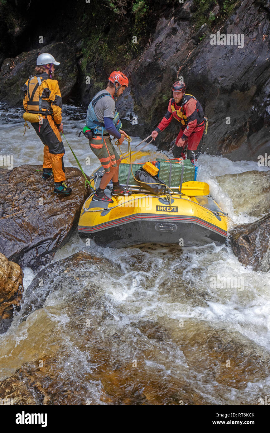 Rafters portaging through Sidewinder rapid inside the Great Ravine on ...