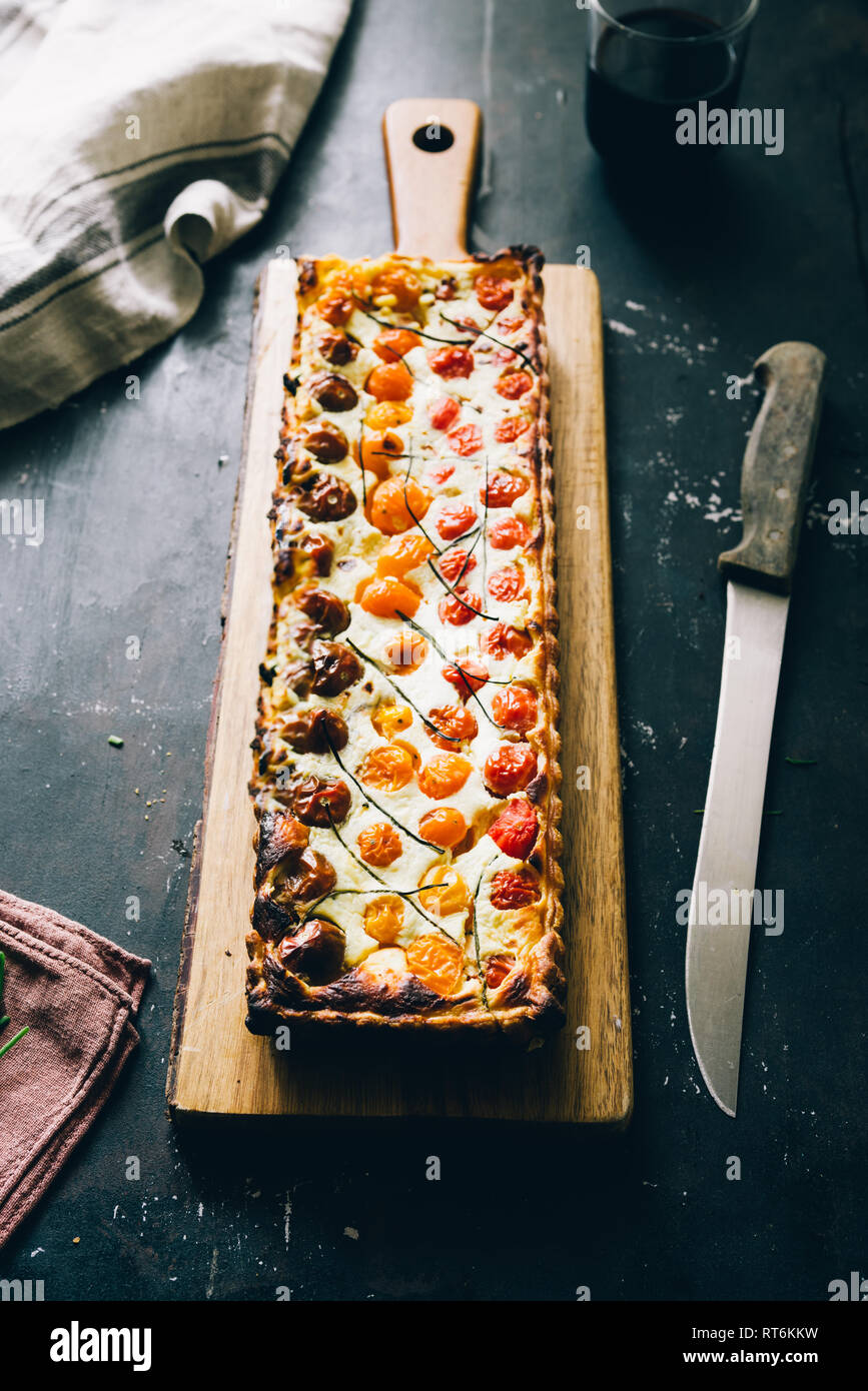 Homemade pie ( quiche) with ricotta, fresh colored tomatoes ...