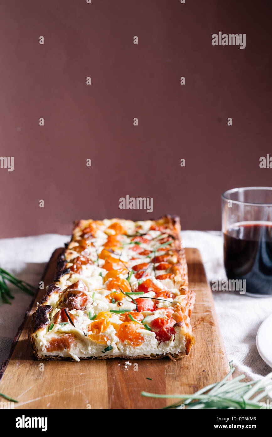 Homemade pie ( quiche) with ricotta, fresh colored tomatoes ...