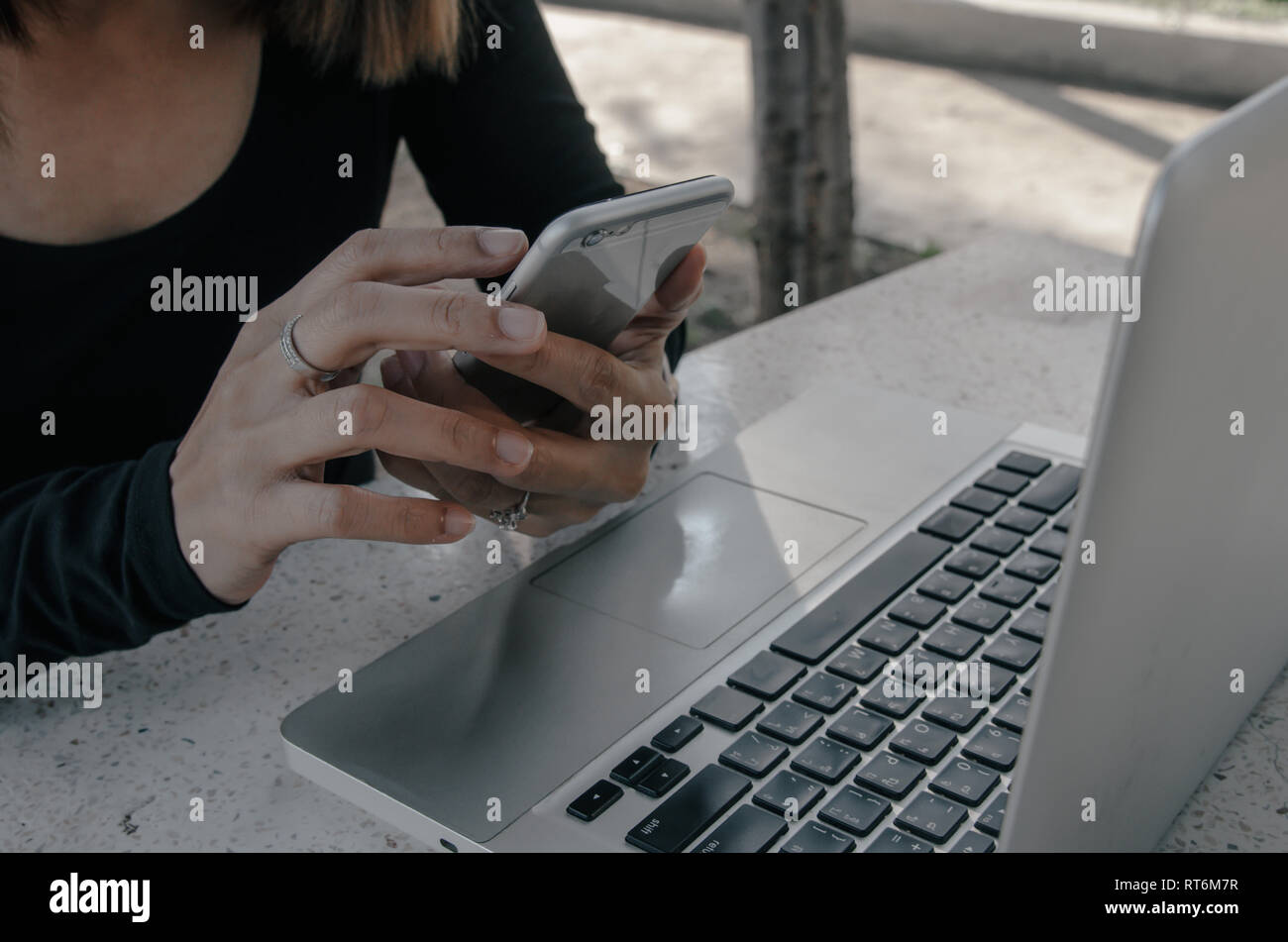 Woman smartphone laptop computer hi-res stock photography and images ...
