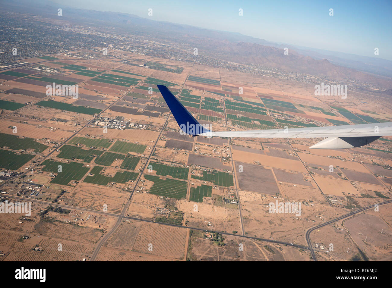 A view from 10,000 feet looking out the window of an airplane Stock ...