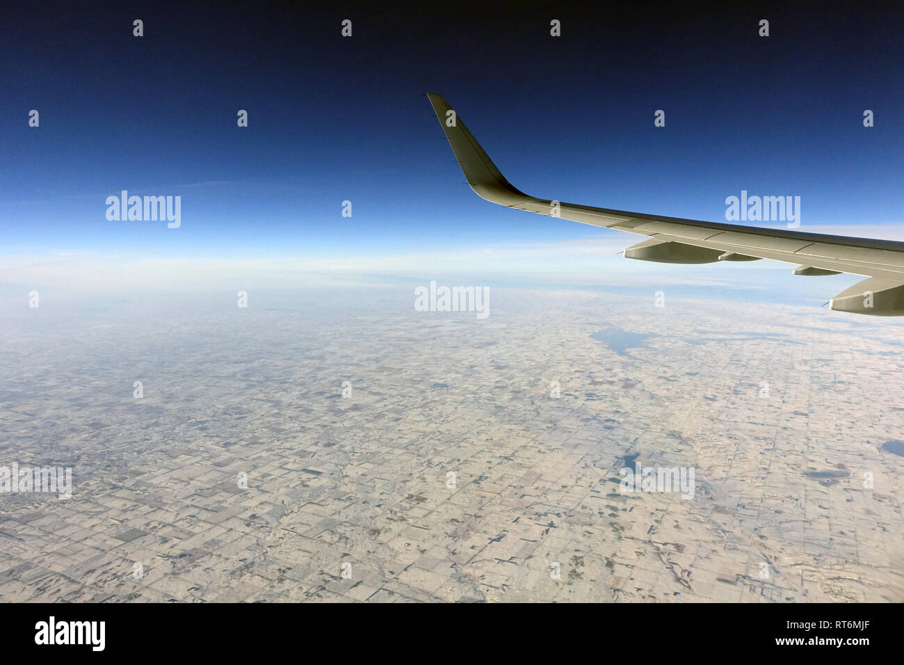 A view from 10,000 feet looking out the window of an airplane Stock ...