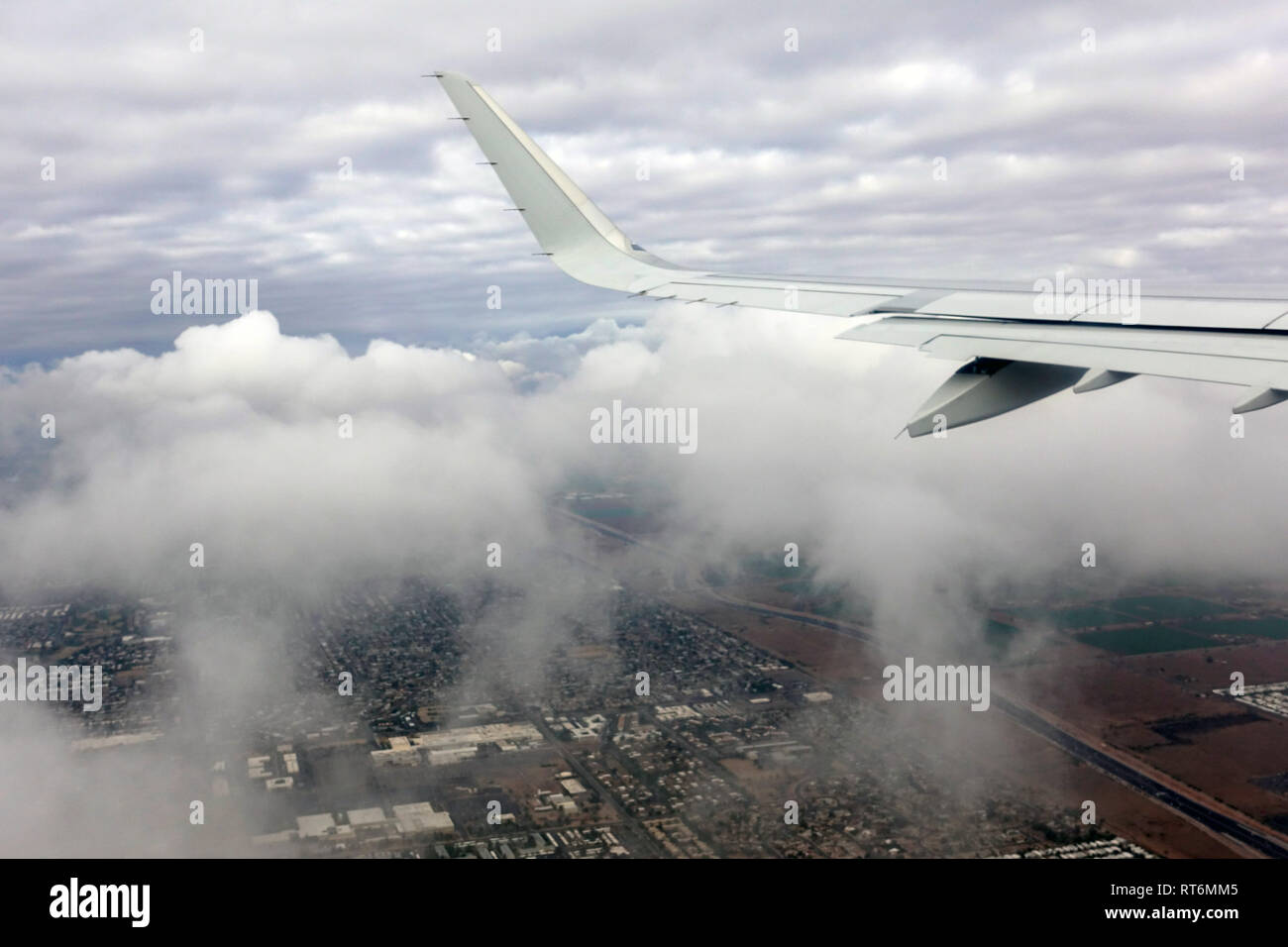 A view from 10,000 feet looking out the window of an airplane Stock ...