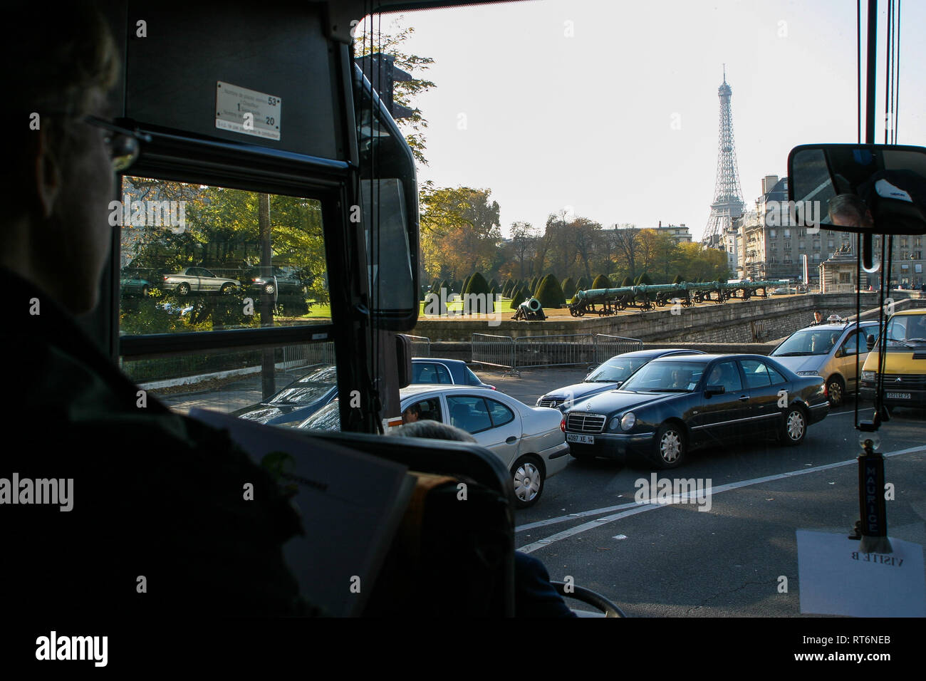 Urban traffic seen through a tourism coach windshield, Paris, France ...