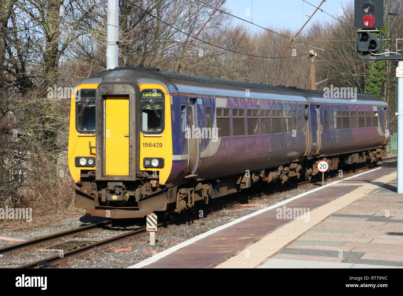 Class 156 super sprinter diesel multiple unit in Northern livery arriving at Lancaster station ...