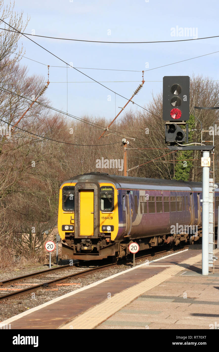 Class 156 super sprinter diesel multiple unit in Northern livery arriving at Lancaster station ...