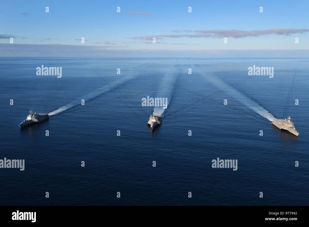 U.S. Navy Independence variant littoral combat ships USS Tulsa, left ...