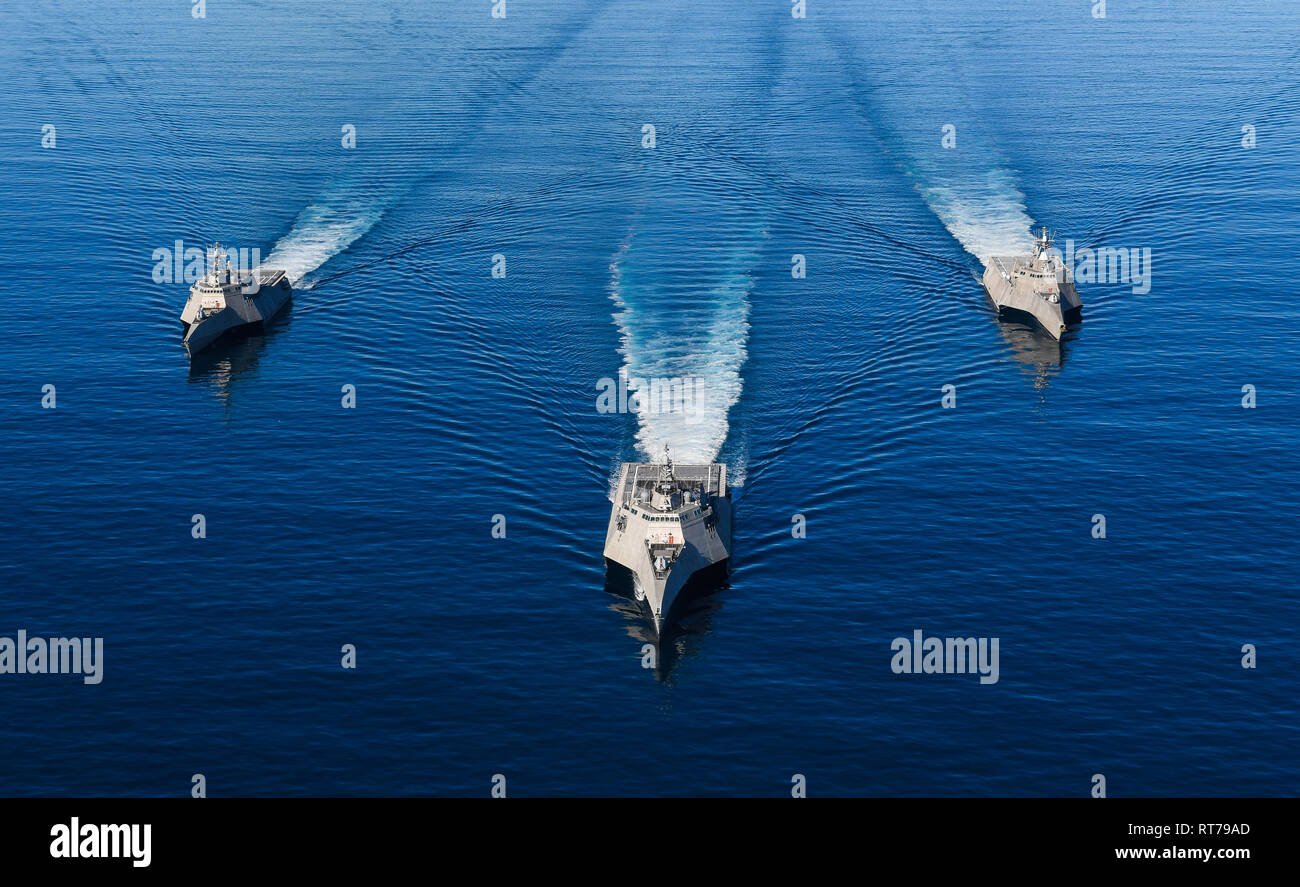 U.S. Navy Independence variant littoral combat ships USS Tulsa, left ...