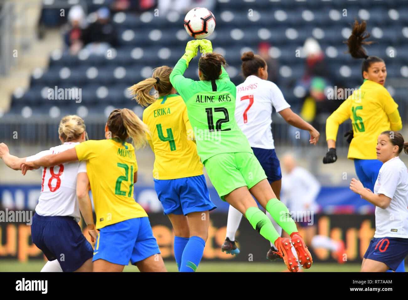 Chester, PA, USA. 27th Feb, 2019. Brazil keeper Aline (12) punches away ...
