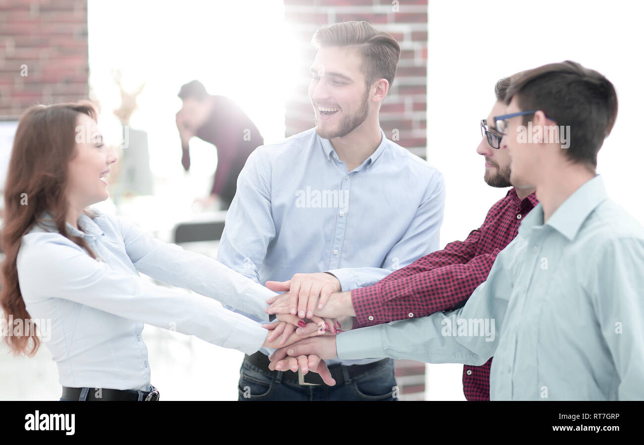 Group of people hands together partnership teamwork Stock Photo - Alamy