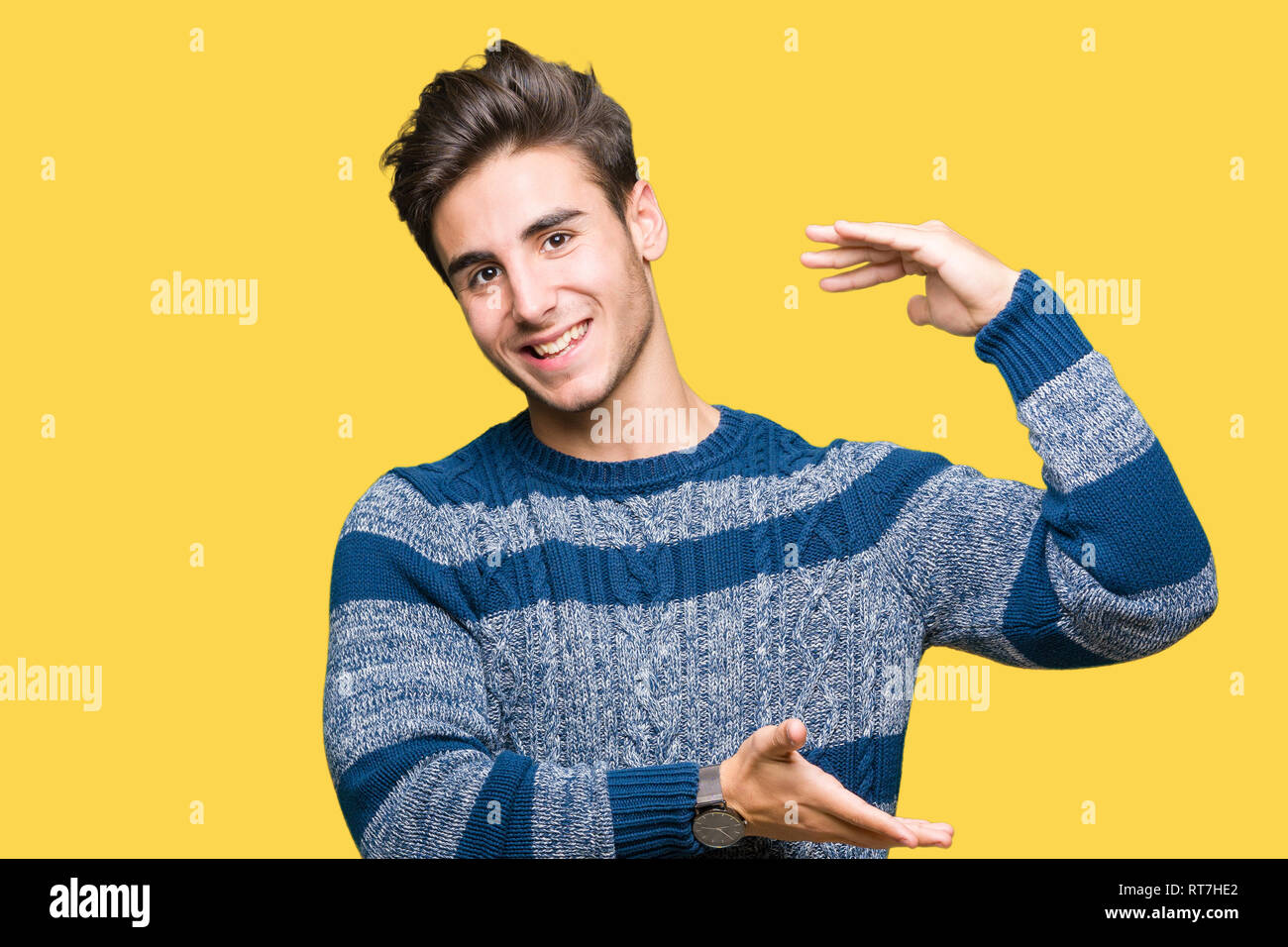 Young handsome man over isolated background gesturing with hands ...