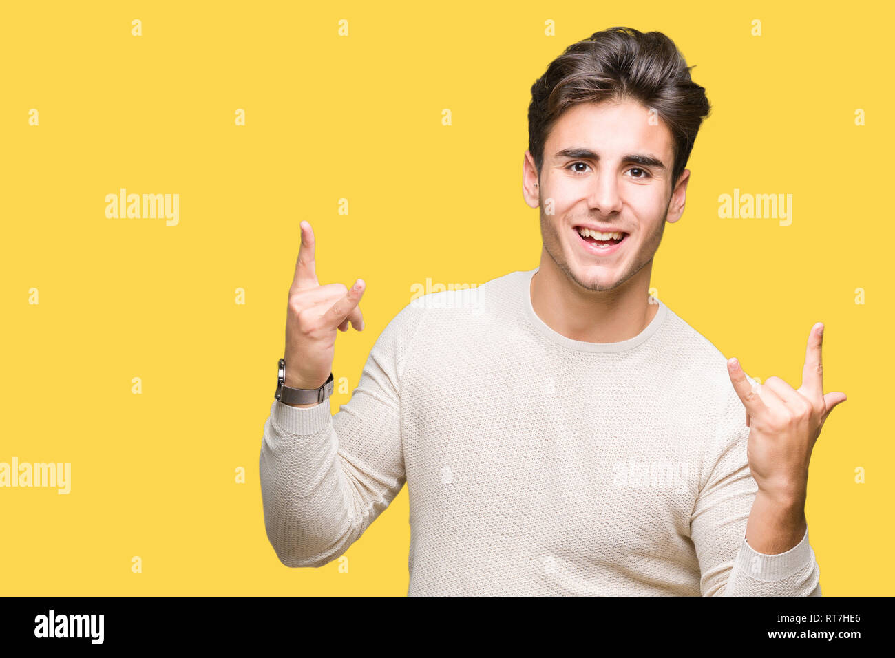 Young handsome man over isolated background shouting with crazy ...