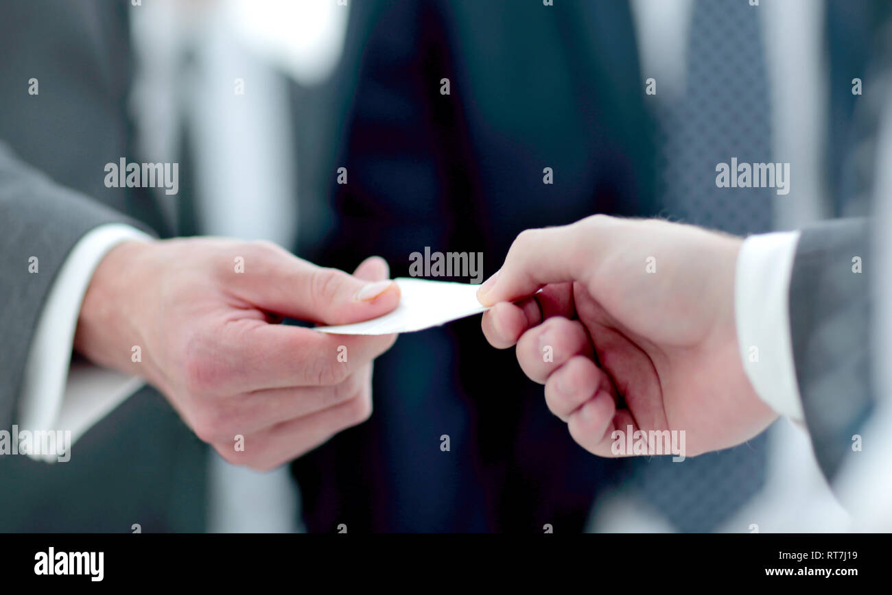 Handing business card hi-res stock photography and images - Alamy