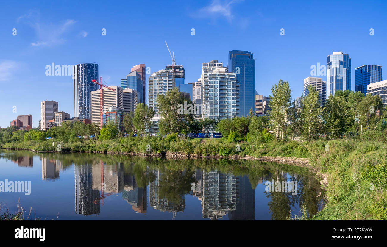 Calgary skyline along the bow river on a beautiful spring morning ...