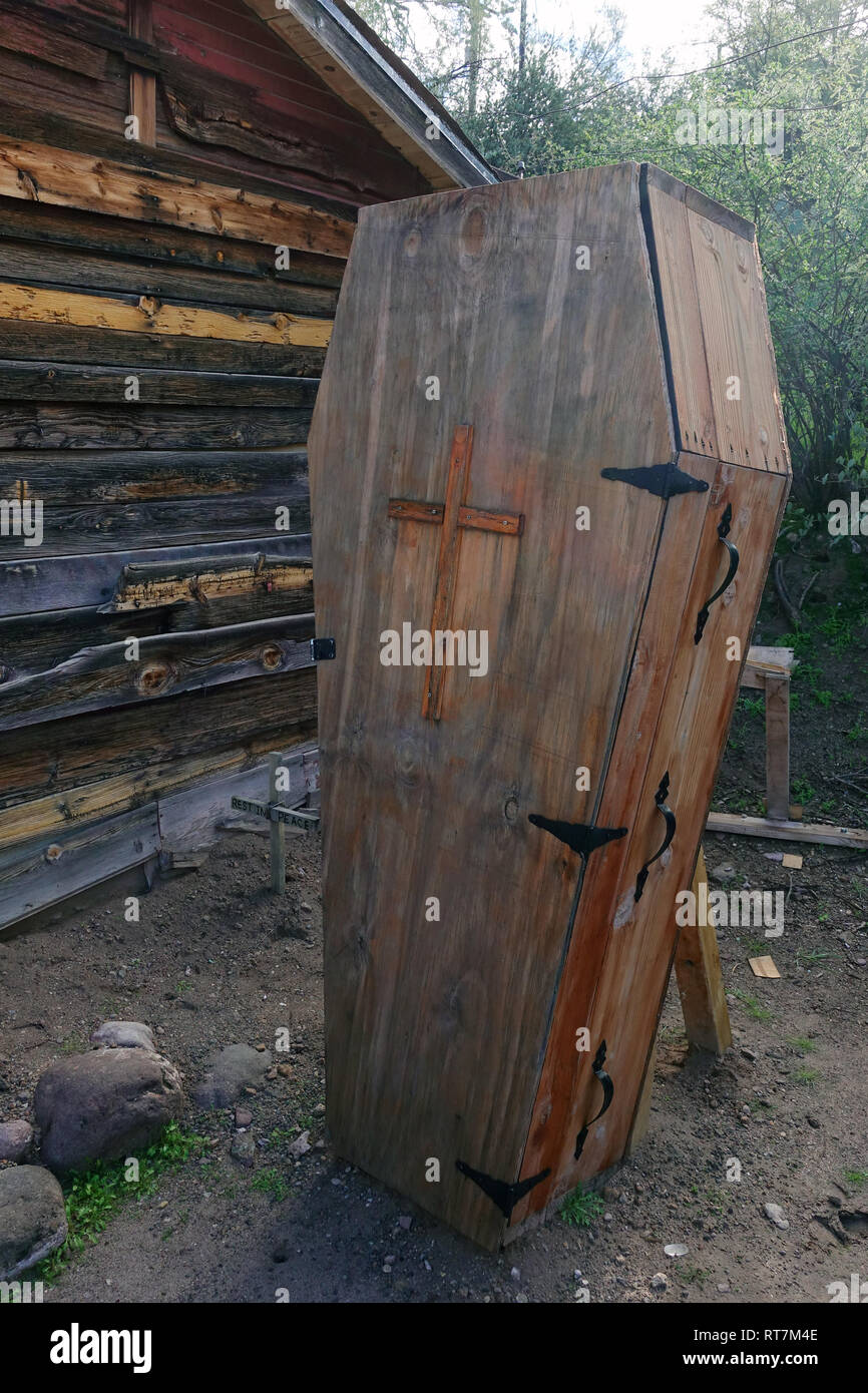 A wood coffin sits outside Stock Photo - Alamy