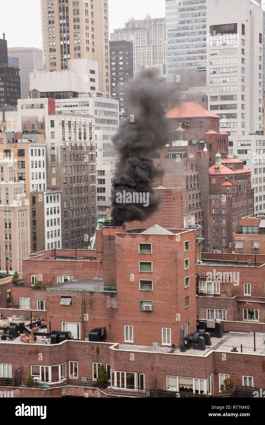 Black Smoke Polluting Air in Midtown Manhattan, New York City, USA ...
