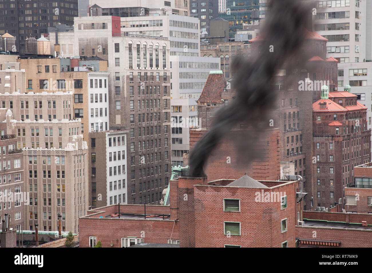 Black Smoke Polluting Air in Midtown Manhattan, New York City, USA ...
