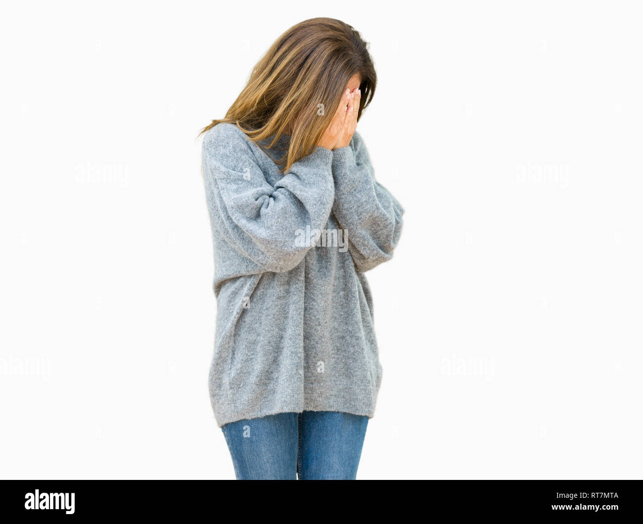 Beautiful middle age woman wearing winter sweater over isolated ...