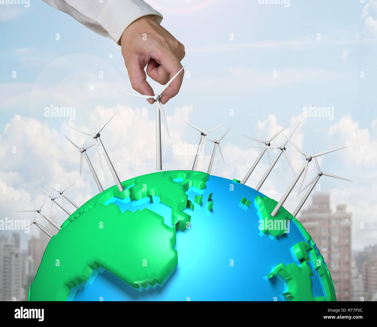 Human hand holding wind turbine on globe, isolated on white background ...