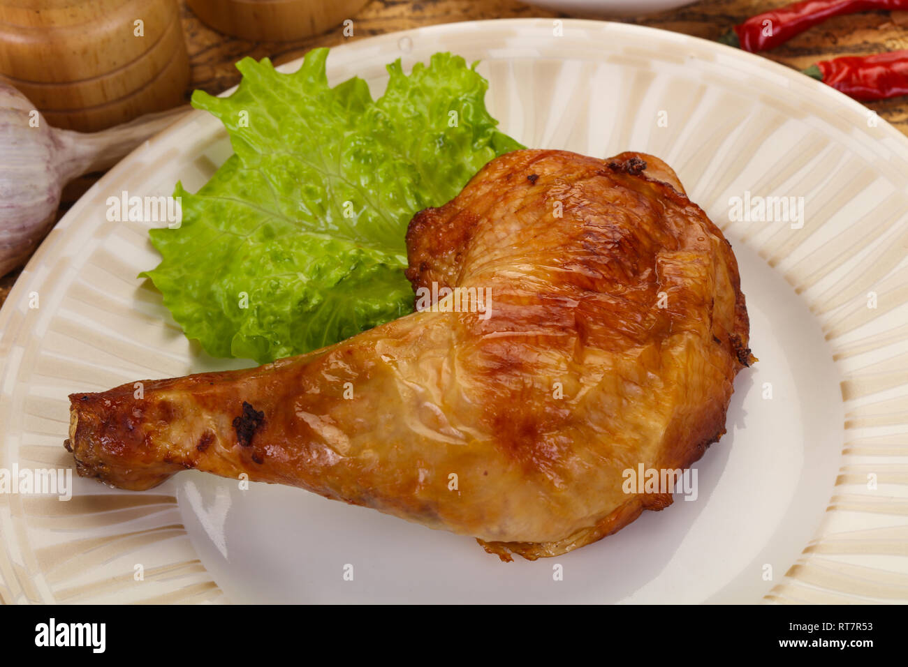 Crispy tasty Roasted chicken leg Stock Photo - Alamy