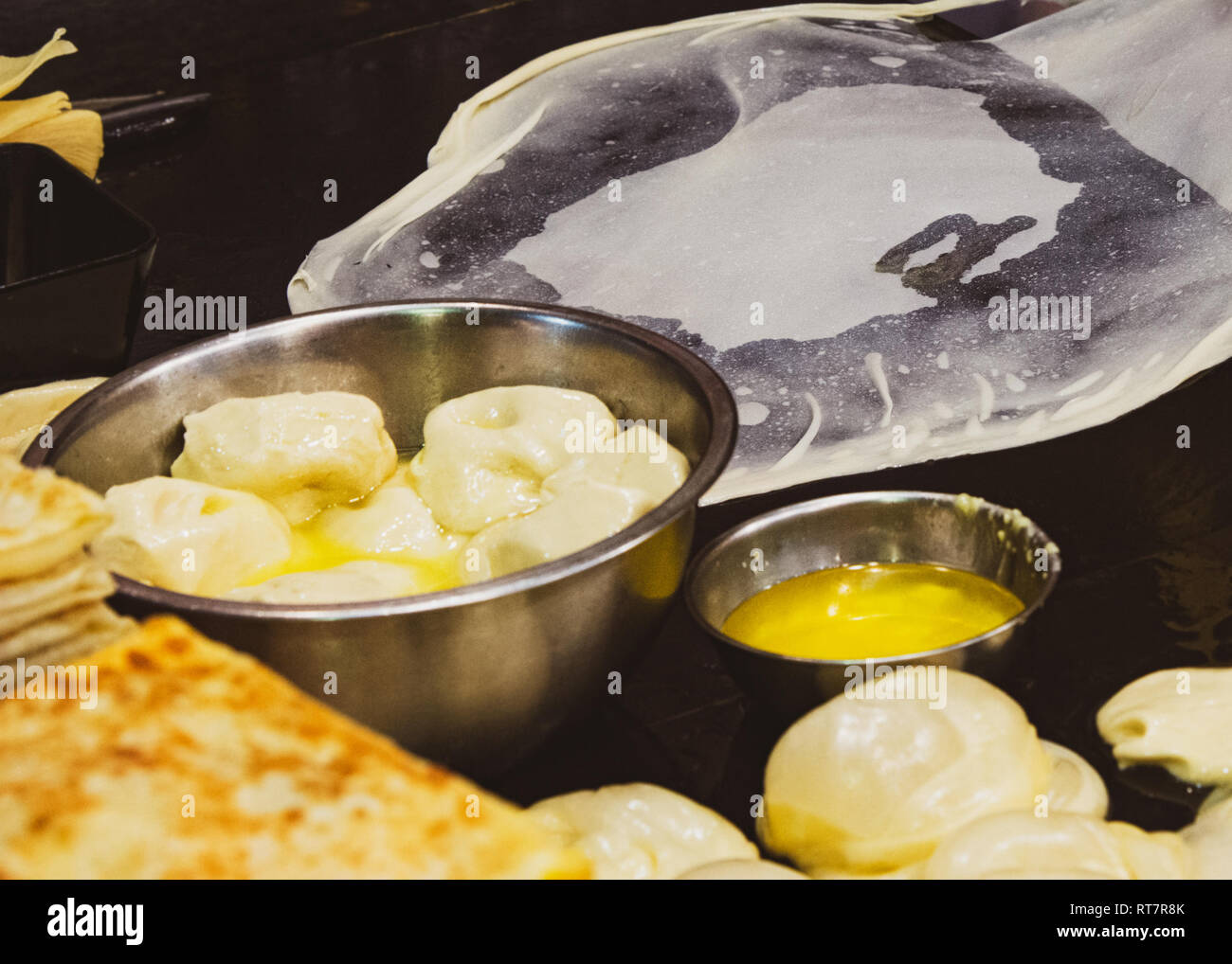Making of Roti Canai, cooking process, Indian traditional street food ...