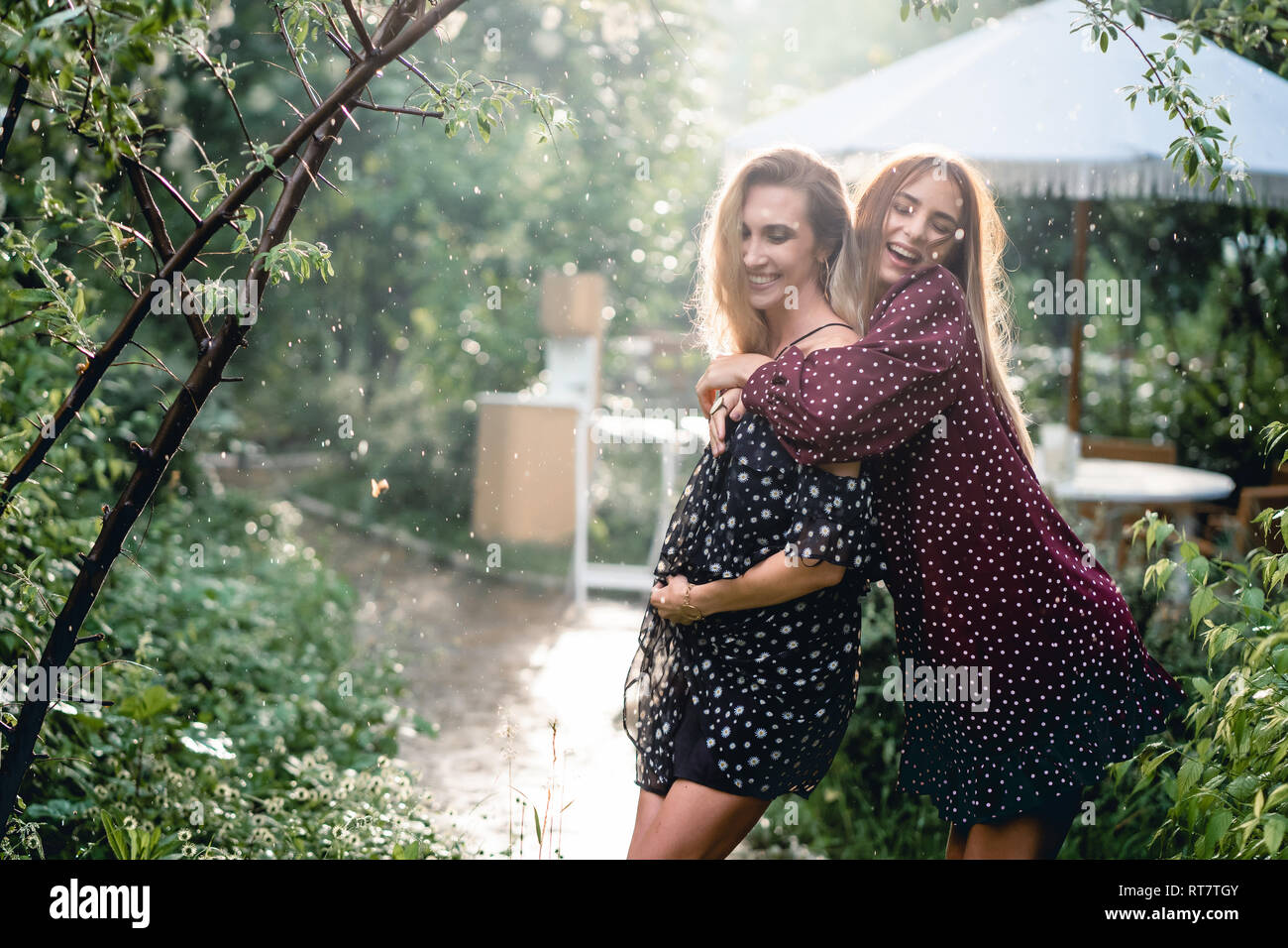 Two girls in a summer park Stock Photo - Alamy