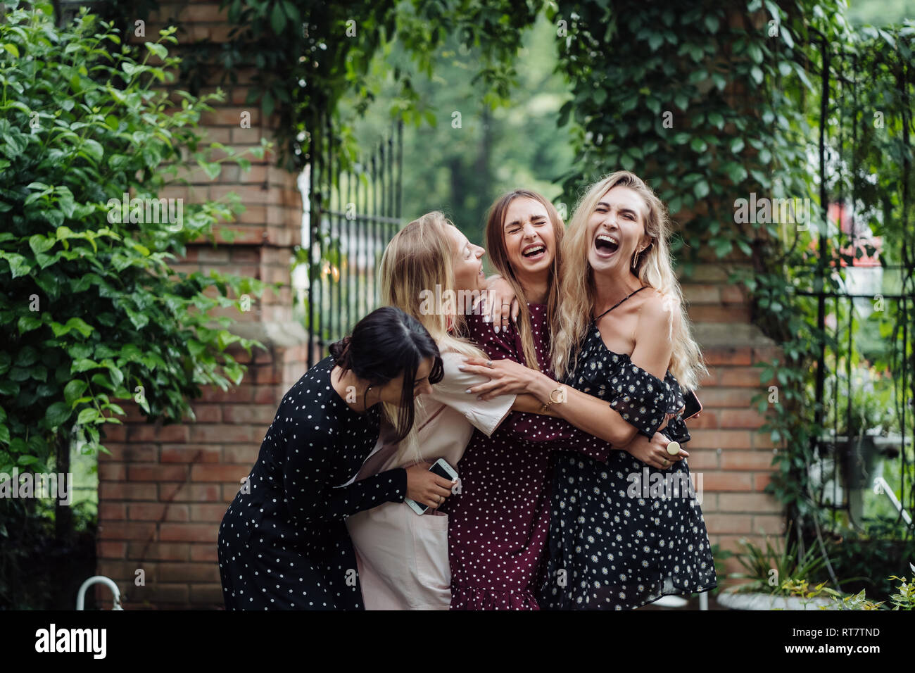 Four girls are having fun Stock Photo - Alamy