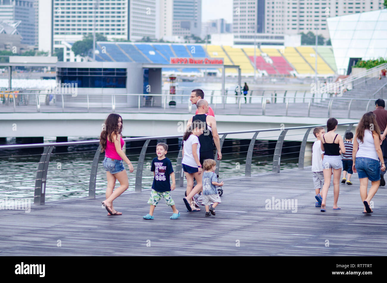 Kids Playing at Marina Bay Sands Platform Stock Photo - Alamy