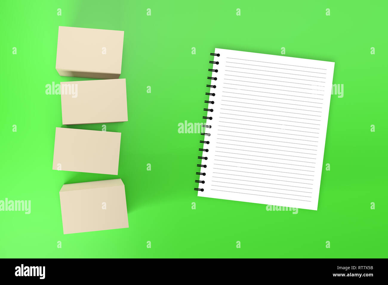 Empty boxes and ruled notebook on colored background with copy space ...