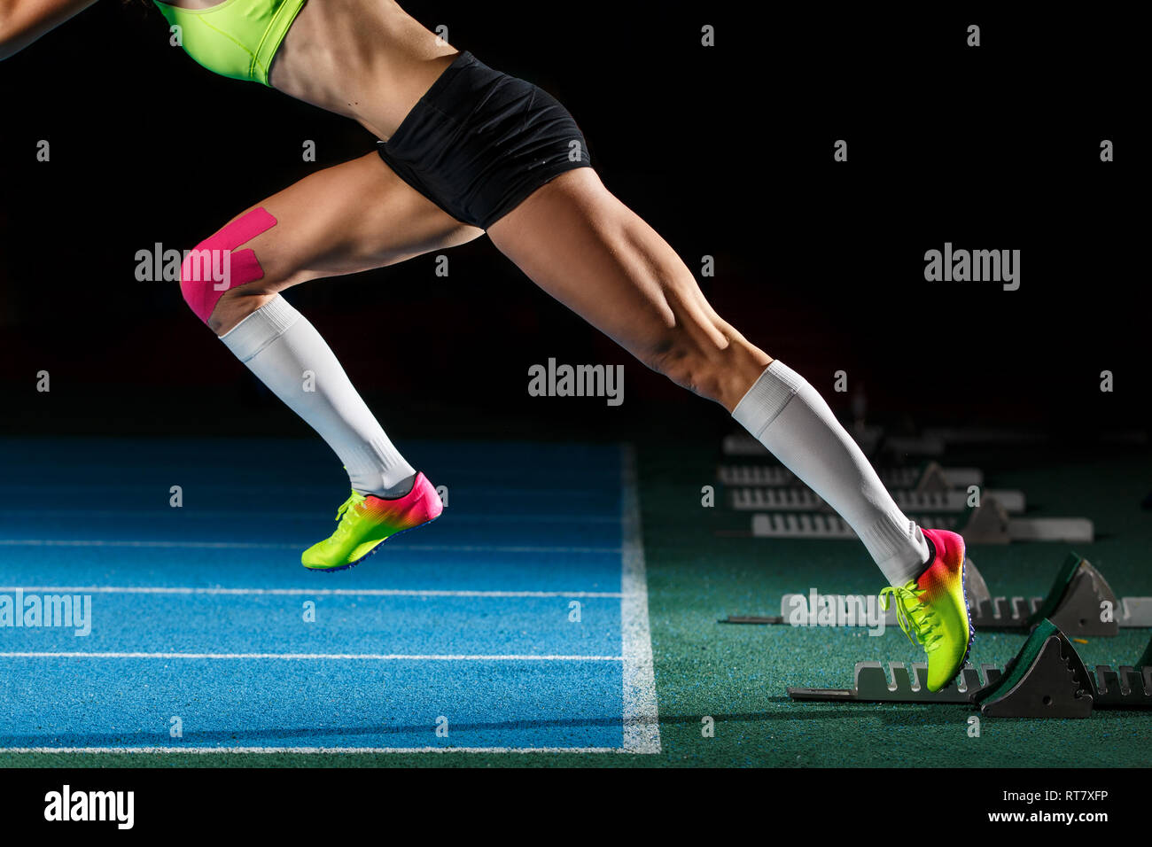 Female sprinter starting block hi-res stock photography and images - Alamy