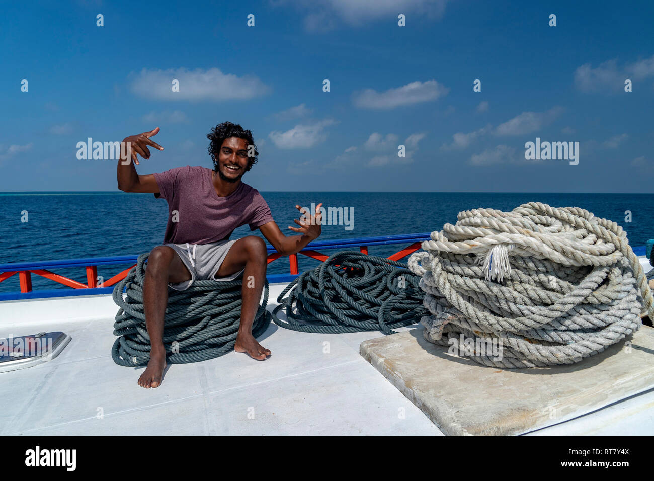Young maldives man portrait looking at you happy and smiling Stock ...