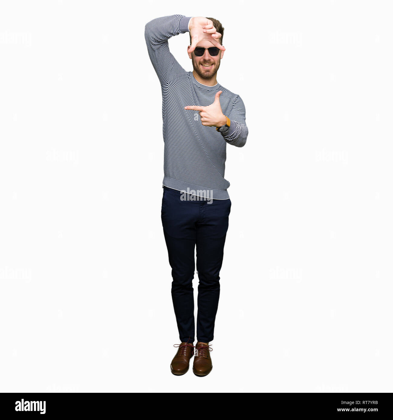 Young hispanic man hands making Cut Out Stock Images & Pictures - Alamy