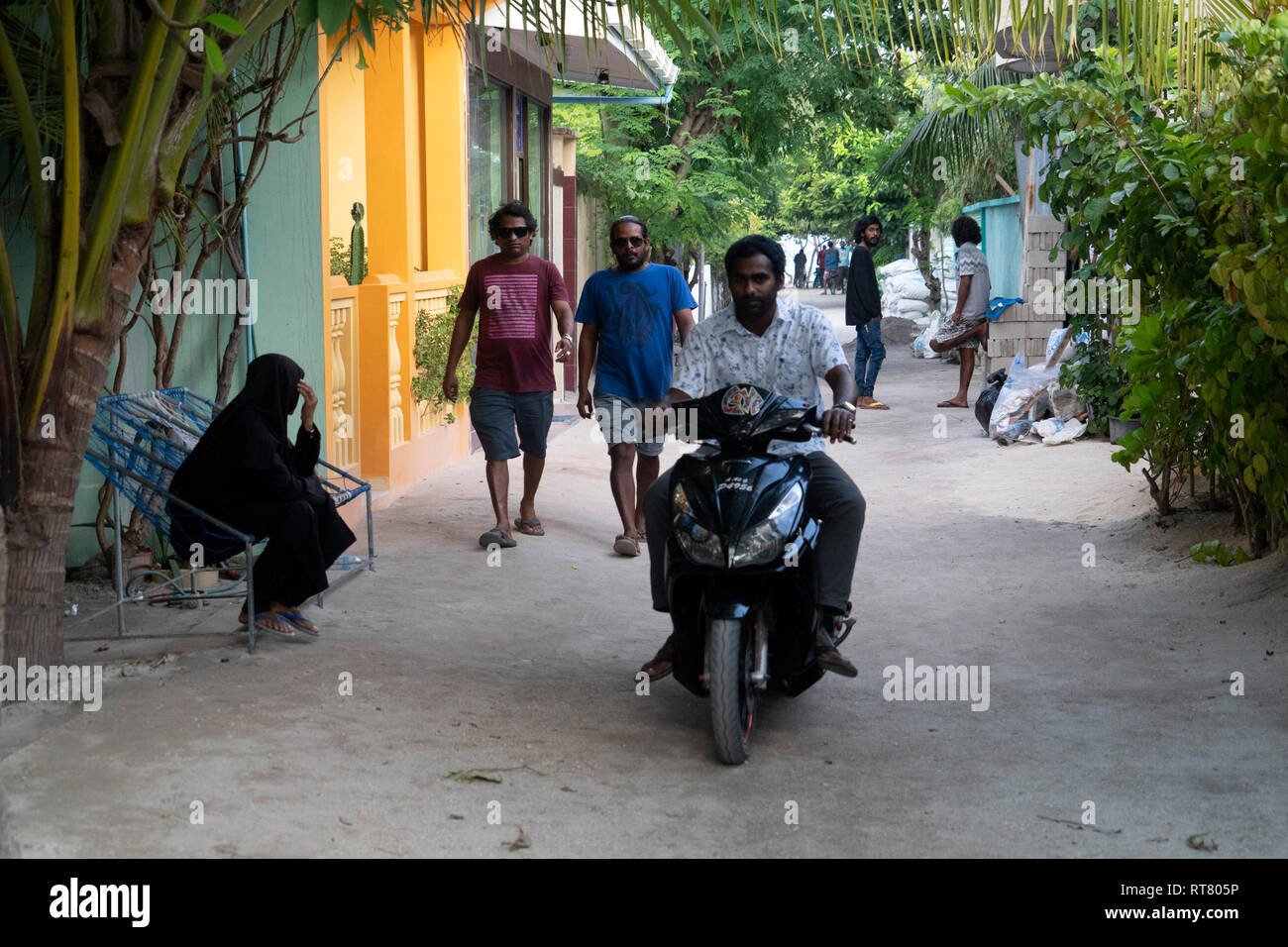 Maldives people village hi-res stock photography and images - Alamy