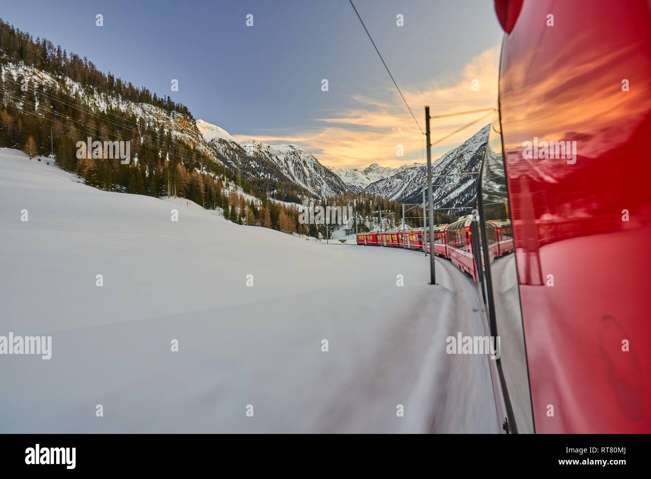 The Bernina Express Red Train through the Alps Stock Photo - Alamy