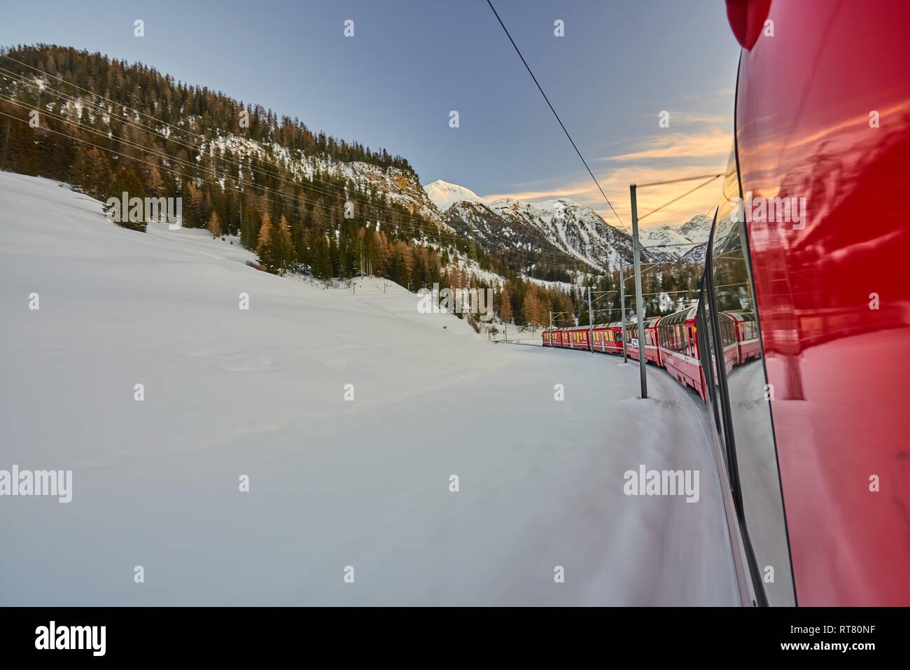 The Bernina Express Red Train through the Alps Stock Photo - Alamy
